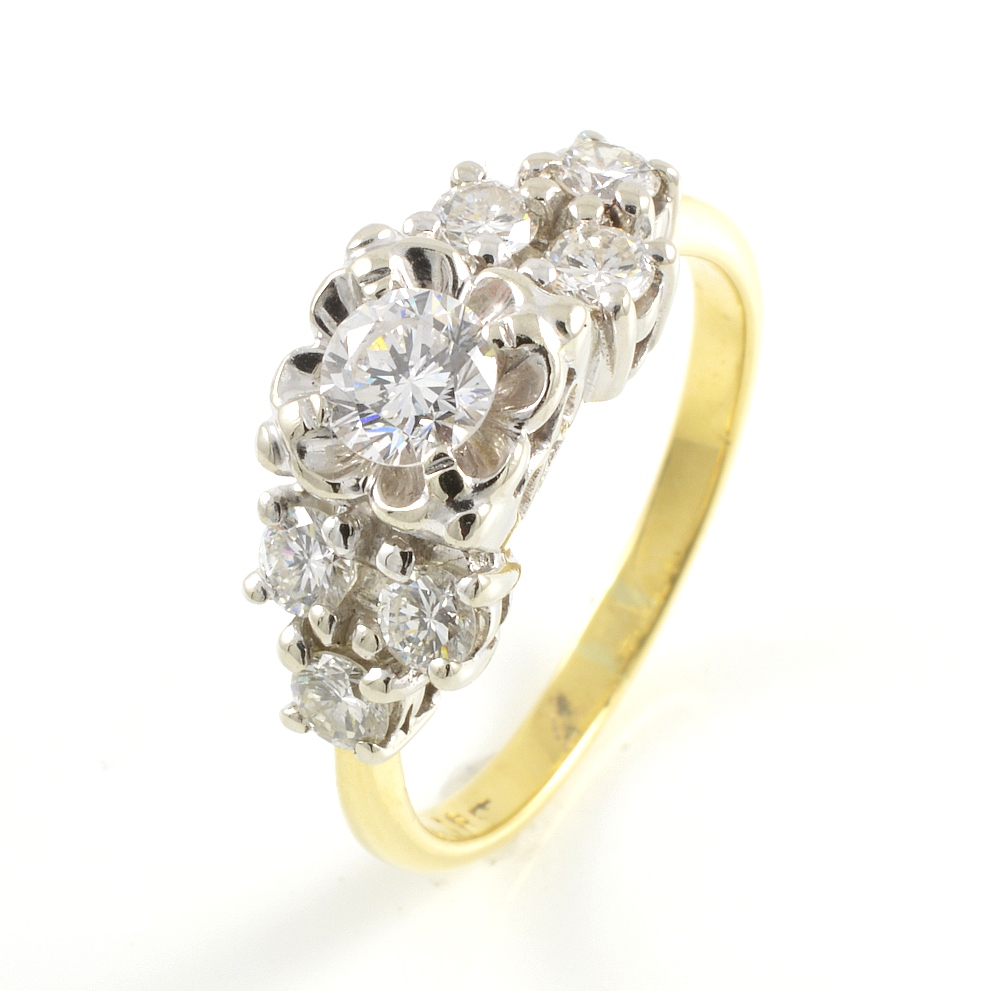 18ct gold brilliant cut diamond seven stone ring.